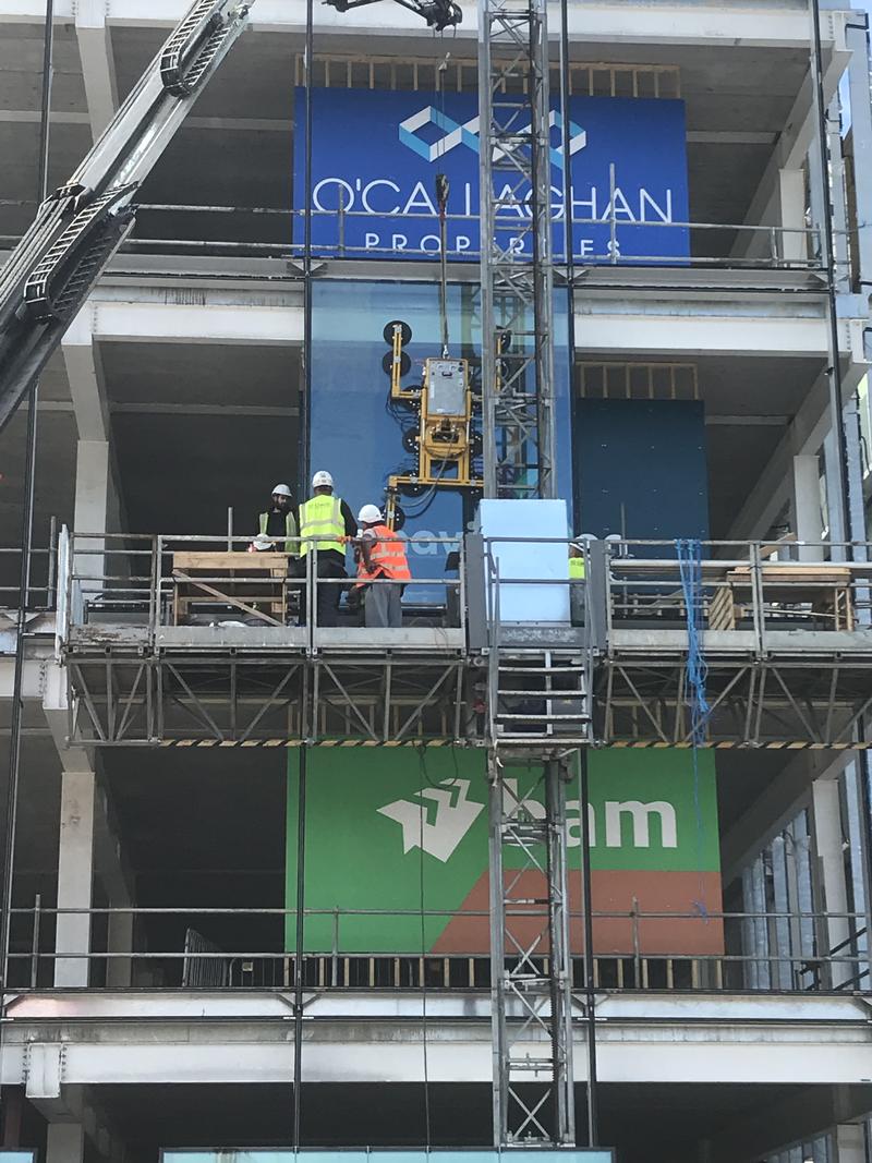 Installing first of the large units on the North Elevation of ...